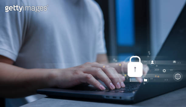 close up programmer man hand type keyboard input code for register and unlock system password on ...