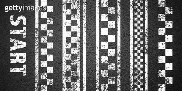 Asphalt road with white start or finish checkered line marking ...