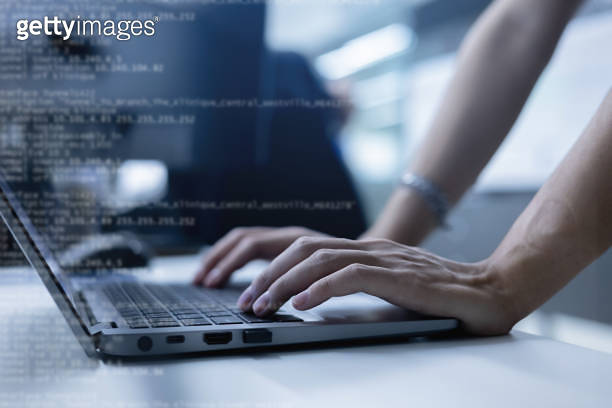 close up specialist programmer man hand type configuration on keyboard ...