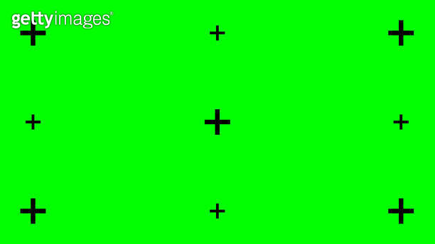 Green screen background with black tracking cross shaped marks ...