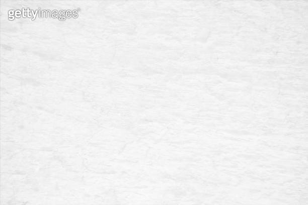 Empty and blank rough rustic textured light grey or gray coloured ...