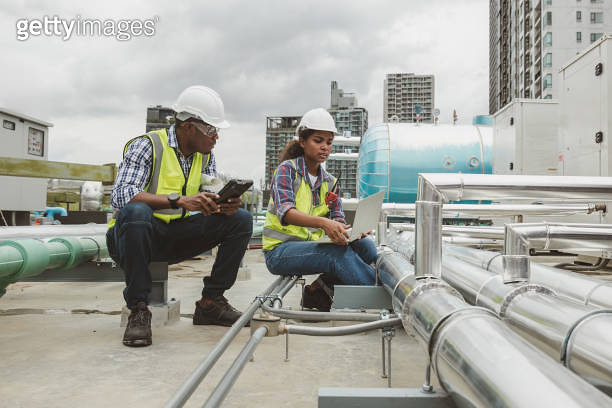 Industrial engineer work on site. engineer visit and inspection site ...