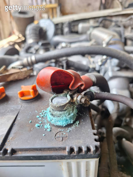 A corroded car battery terminal. Oxidized and dirty car battery ...