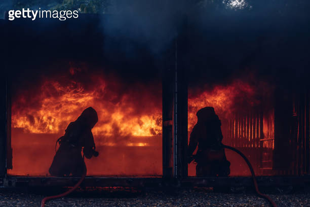 Firefighter Concept. Several firefighters go offensive for a fire ...