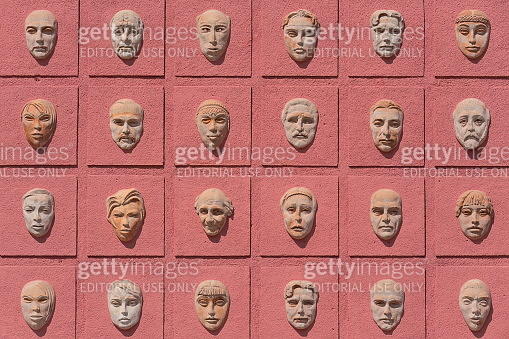 Facade of the Teatri Andon Zako Cajupi decorated with the masks of ...