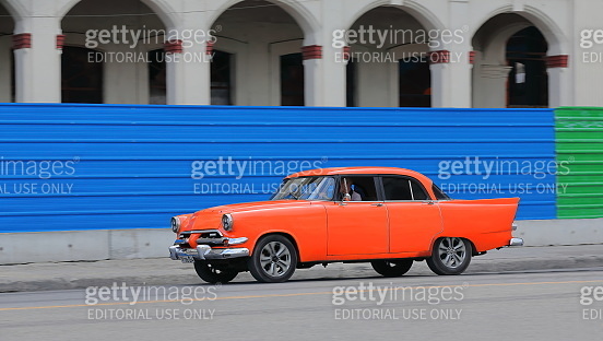 Oldtimer red-orange almendron car -yank tank, Dodge classic- from 1956 ...