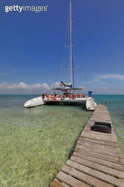 Wood plank pier at the Cayo Iguana or Macho de Afuera Key, mooring for ...