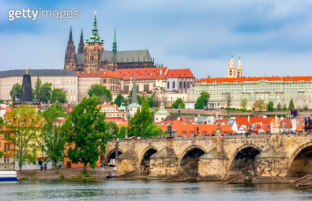 Prague cityscape with Prague Castle and Charles bridge, Czech Republic ...