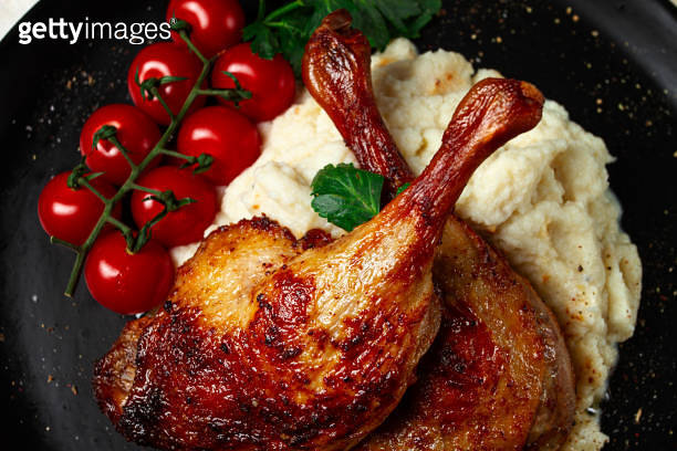 Fried duck shank, cauliflower puree, cherry tomatoes, homemade, no ...