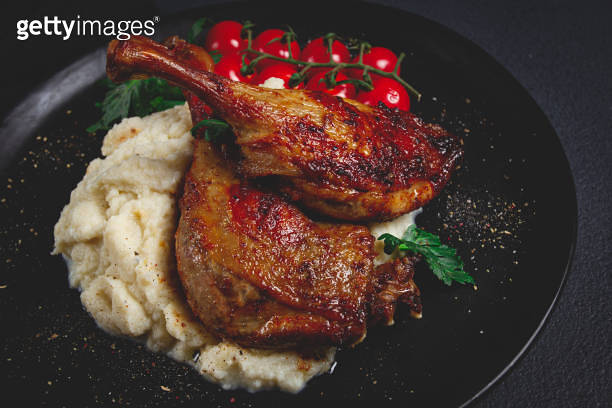 Fried duck shank, cauliflower puree, cherry tomatoes, homemade, no ...