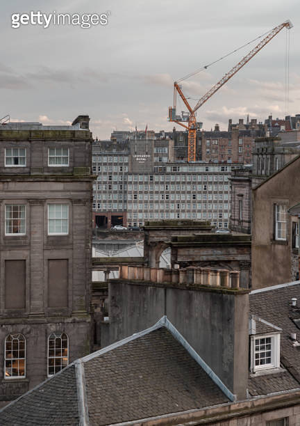 View of urban brick buildings and Leonardo royal hotels with sky ...