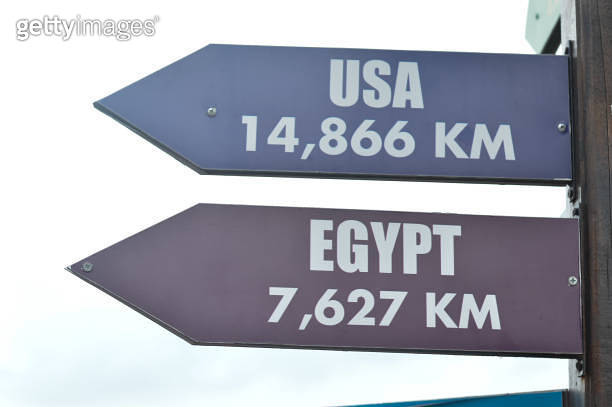 Close-up shots of directional signs pointing towards the enchanting ...