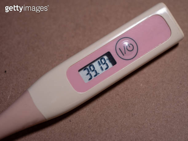 Checking temperature at home with digital thermometer, high body ...