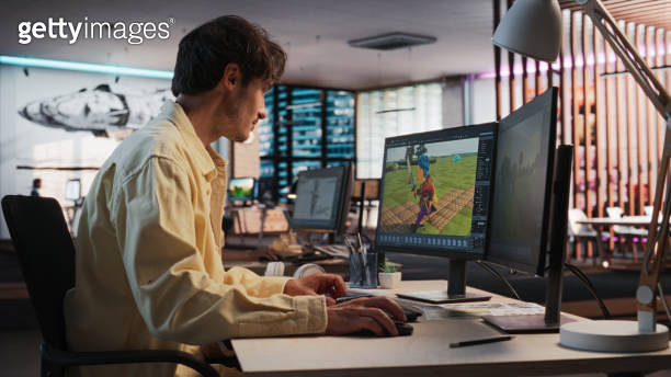 Caucasian Male Game Designer Using Desktop Computer With 3D Modeling ...
