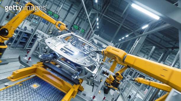 Autonomous Factory with Robotic Arms Autonomously Assembling Car Frames ...