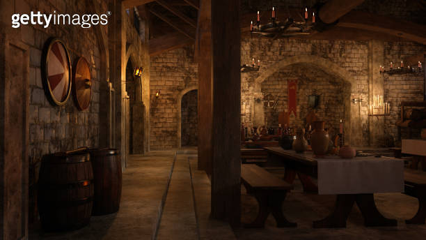 Old medieval dining hall at night with Viking shields hanging on the ...