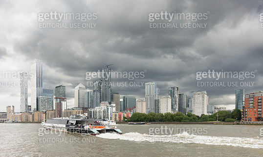 Tornado Clipper, an Uber boat by Thames Clipper, passing Tower Hamlets ...