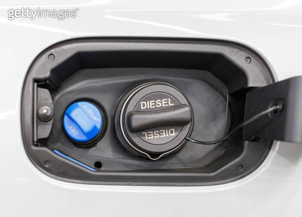 Tank filler neck for AdBlue and Diesel fuel close-up. Adblue diesel ...