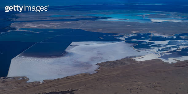Solar salt pans at Laguna Ojo de Liebre on the Pacific Ocean side of ...