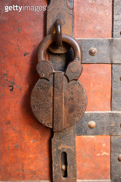 Large rusted vintage lock on a chest. Close up shot, no people ...
