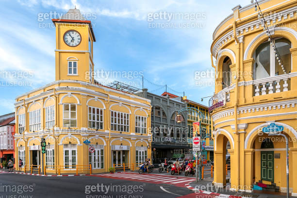 The iconic yellow clock tower, a hallmark of Sino-Portuguese ...