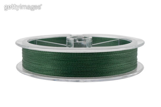 Fishing braided line isolated on white background. Spool of blue cord ...