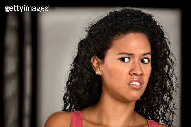 Pacific islander young woman with disgusting and unpleasant expression ...