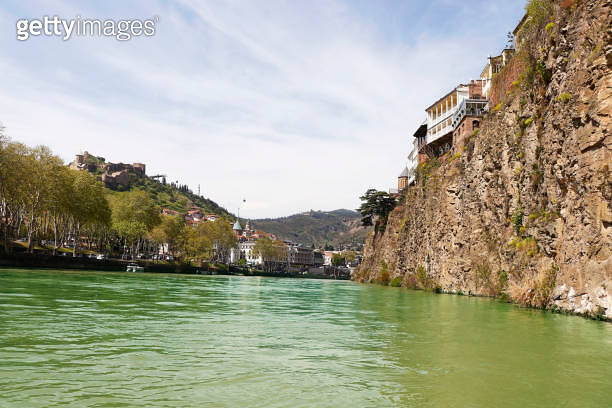 georgian old tbilisi town panoramic aerial view through mtkvari river ...