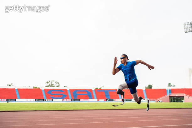 Asian para-athletes disabled with prosthetic blades running at stadium ...