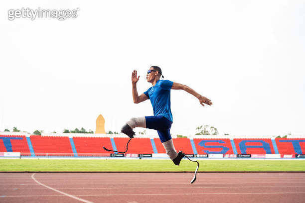 Asian para-athletes disabled with prosthetic blades running at stadium ...