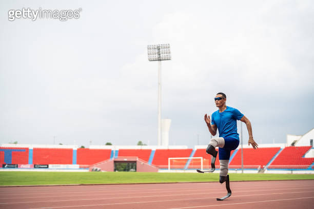 Asian para-athletes disabled with prosthetic blades running at stadium ...