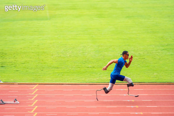 Asian para-athletes disabled with prosthetic blades running at stadium ...