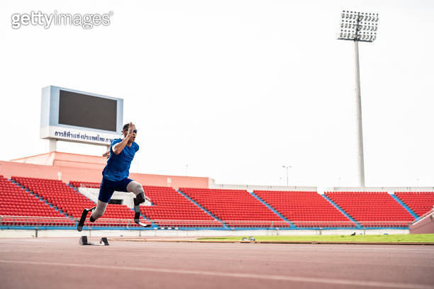 Asian athletes are disabled with prosthetic blades running at stadium ...