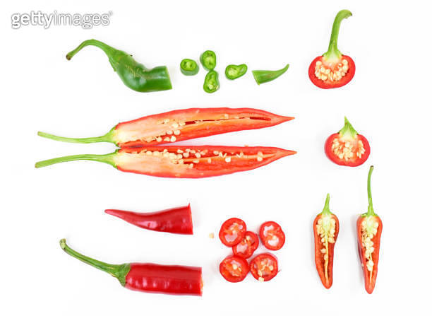 Hot chili peppers and cross section of long peppers. Small peppers ...