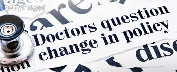 Doctors question change in policy, says cut-out newspaper headline 이미지 ...