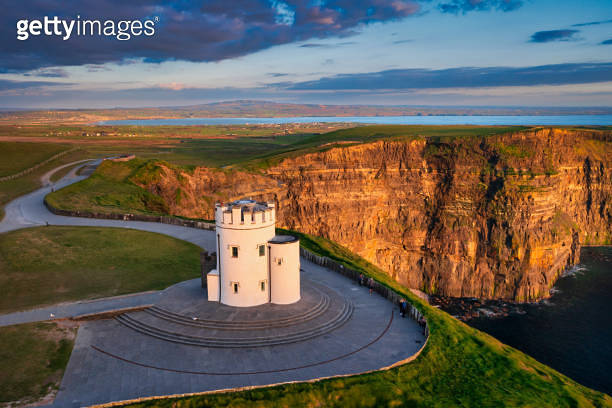 Aerial landscape with the Cliffs of Moher in County Clare at sunset ...