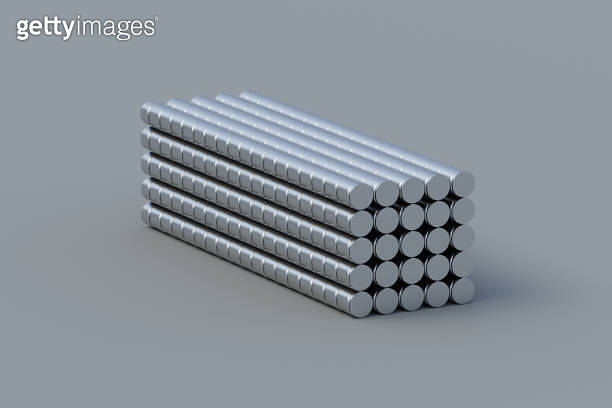 Stack of reinforcing bars on gray background. Ribbed metal rods. Steel ...