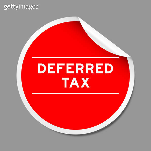 Red color peel sticker label with word deferred tax on gray background ...