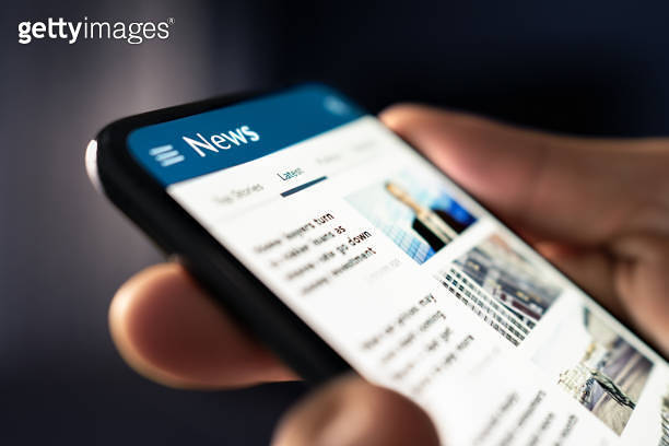 News online. Phone with newspaper headlines and feed. Digital press ...