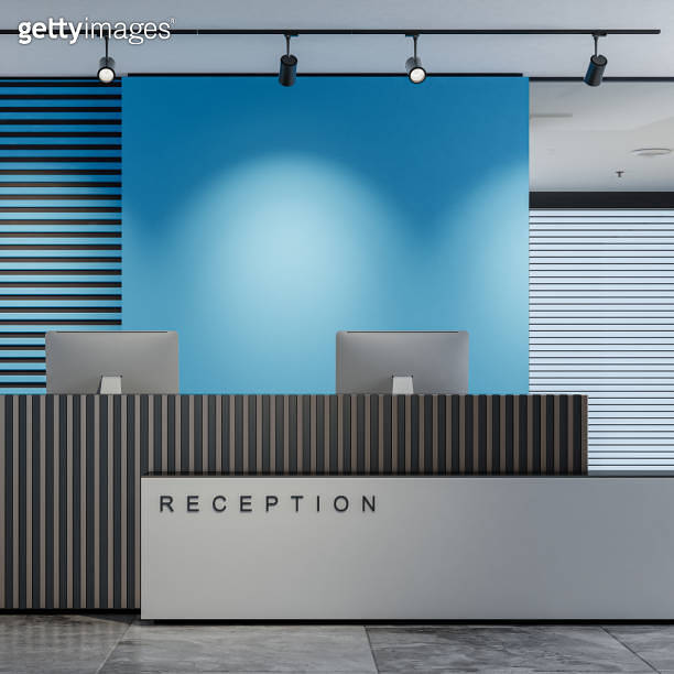 Modern blue and white office interior reception area with big black and ...