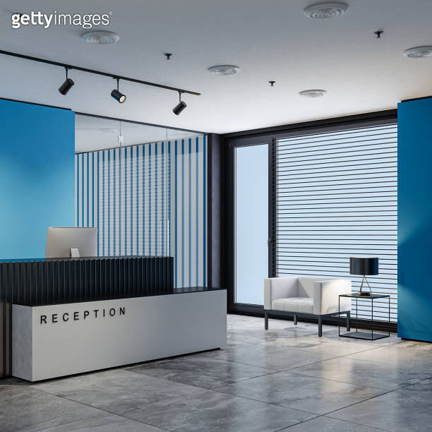 Modern blue and white office interior reception area with big black and ...