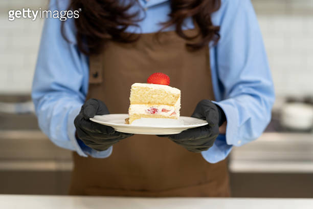 Indulge in the inviting ambiance of a quaint coffee shop. A skilled ...