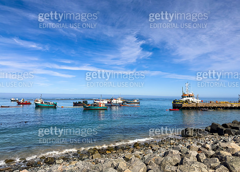 Marine Diamond mining boats at a jetty in small coastal town 이미지 ...