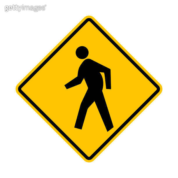 Pedestrian crossing sign. Pedestrians have priority when crossing the ...