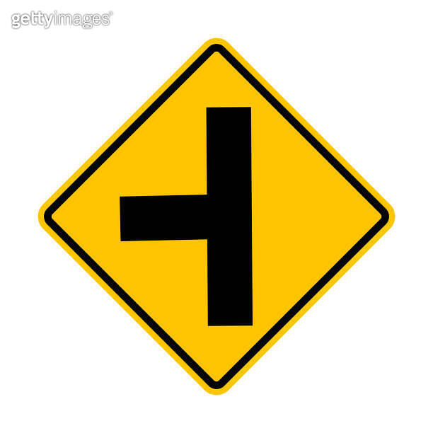 Unregulated intersection with an adjacent road. From left side. Sign ...
