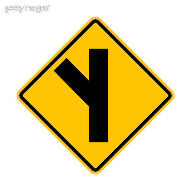 Unregulated intersection with an adjacent road. From left side. Sign ...