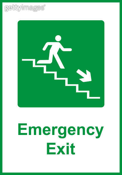 Green sign evacuation exit down steps. Designations location emergency ...