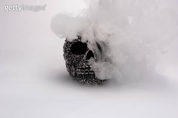 Creepy horror nuts and bolts skull with strange swirling mist homemade ...