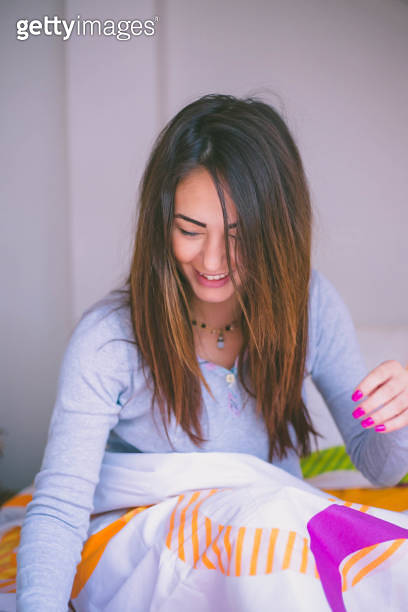 Well-rested woman enjoying happy morning in bed, 이미지 (2155701955) - 게티이미지뱅크