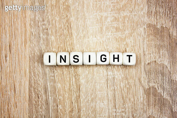 INSIGHT word, text on wooden cubes on the table. Insight concept ...